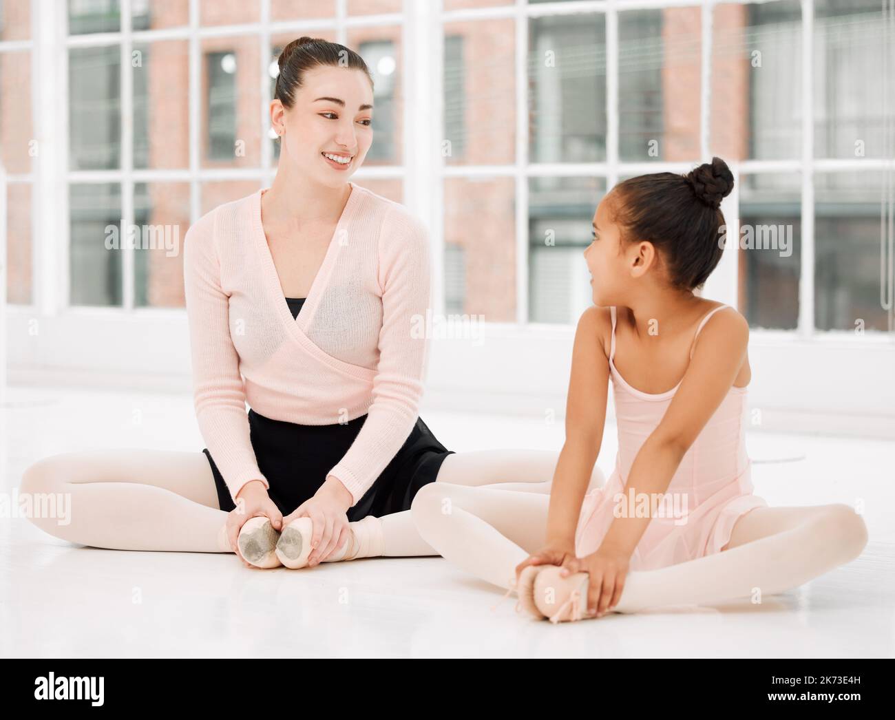 I love how excited she is. a ballet teacher and student taking a break ...