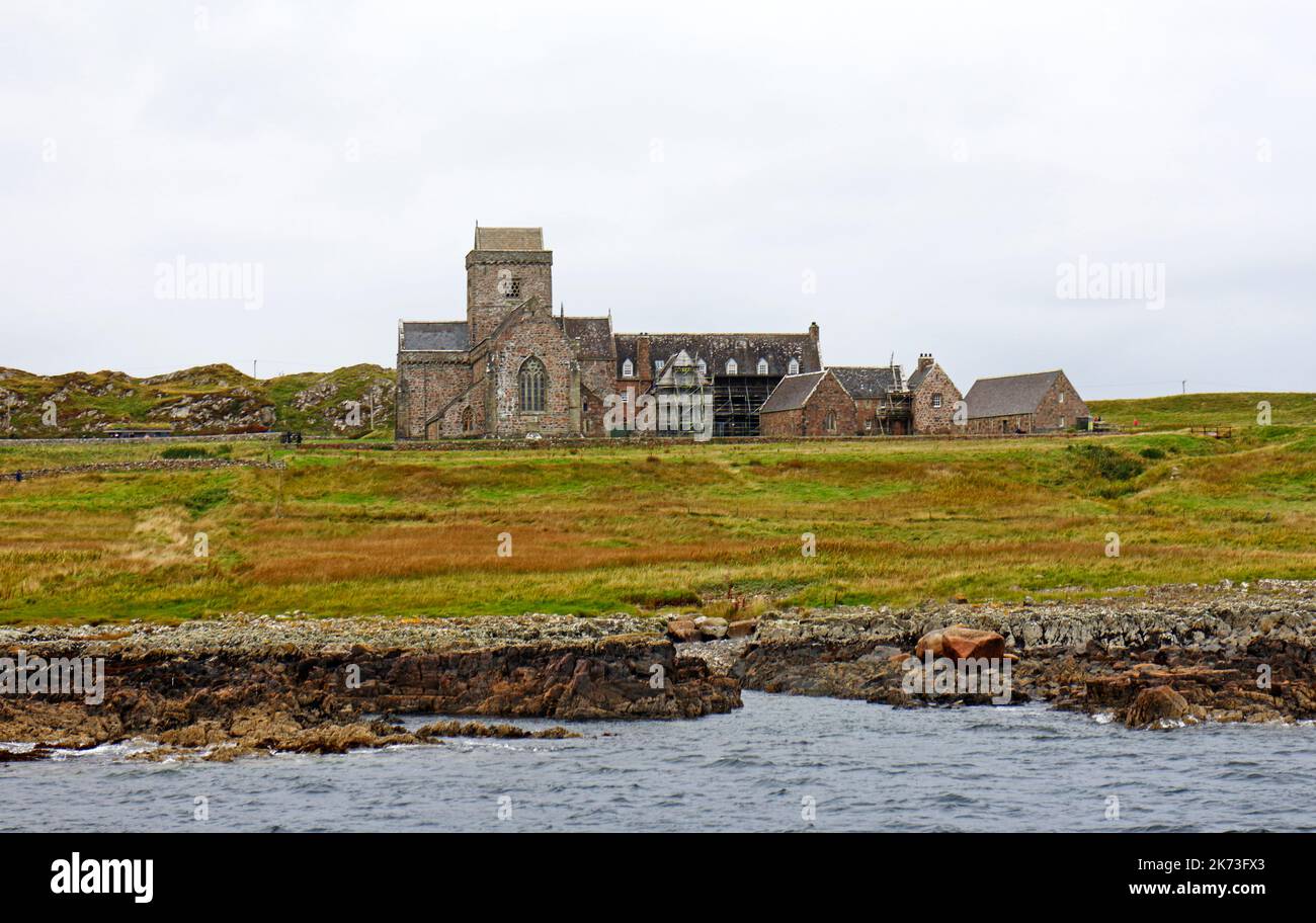 A view of the Abbey on the Isle of Iona taken from a passing boat in ...
