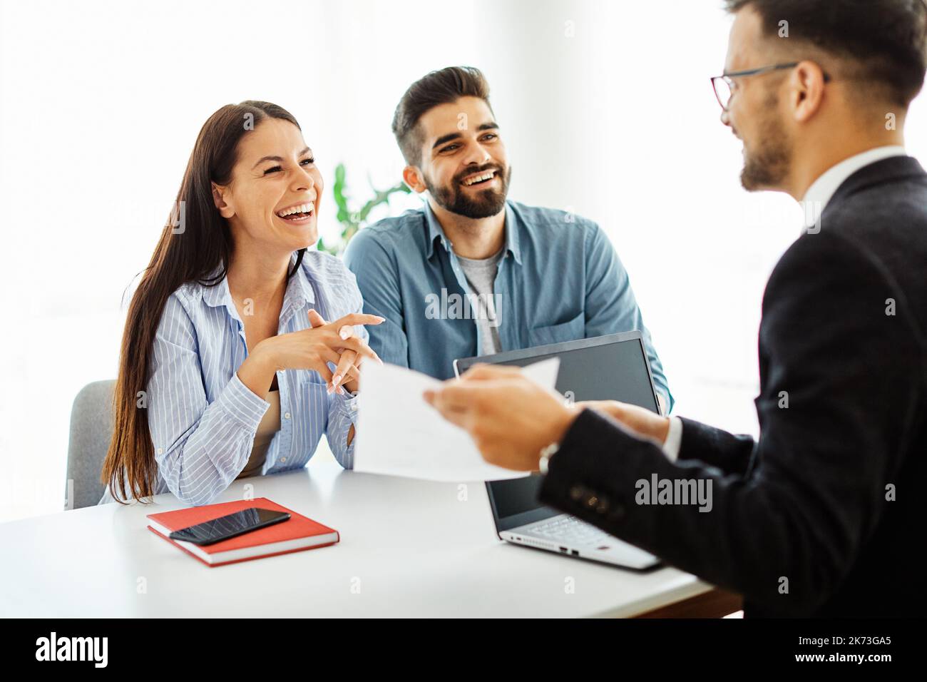 young couple deal contract real estate investment business agreement ...