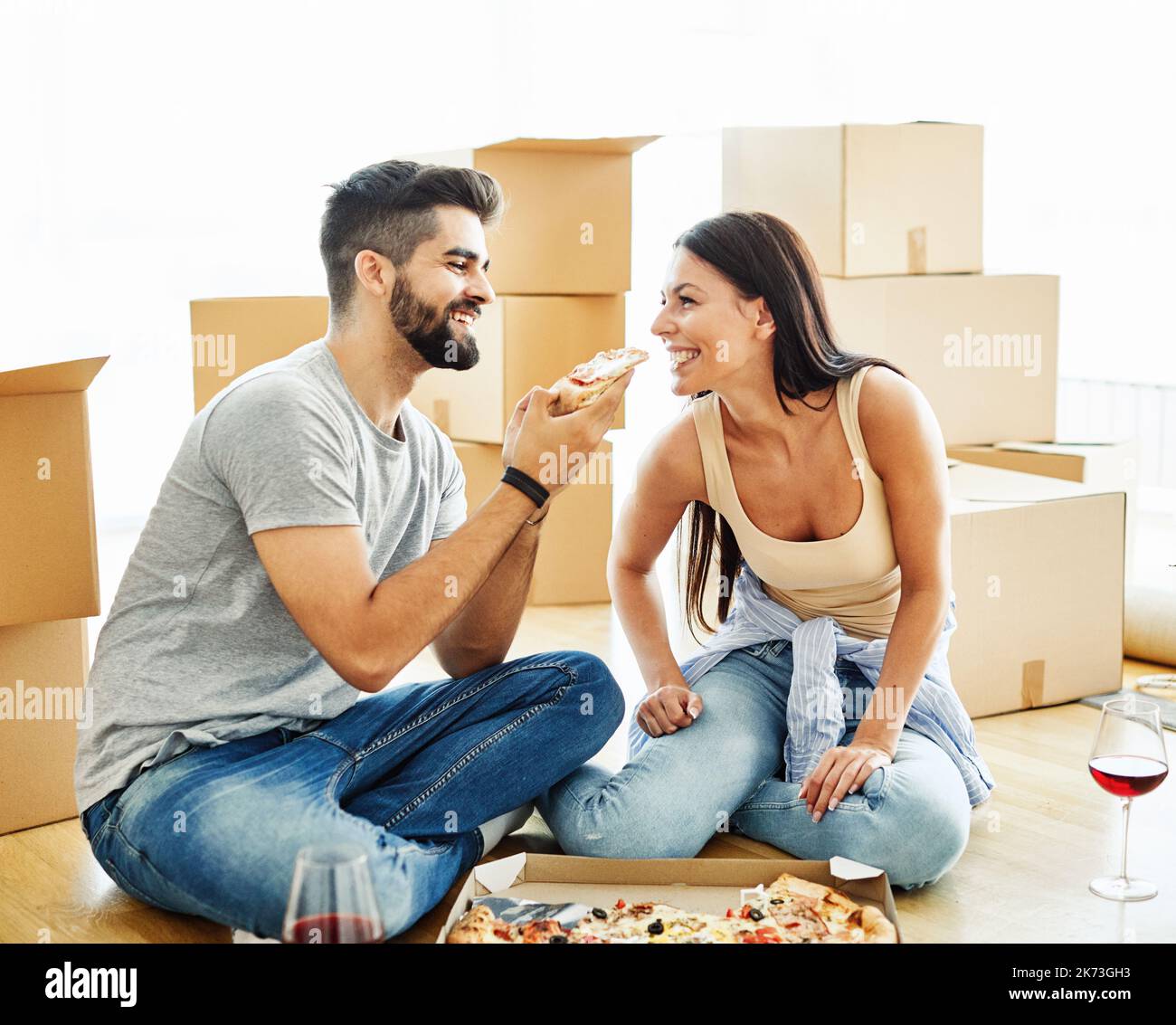 woman couple man box home house moving happy apartment together ...