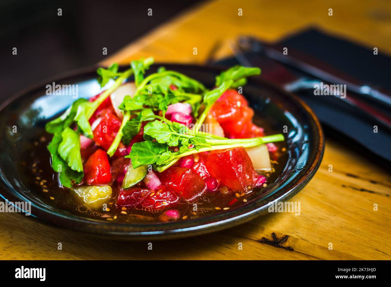 Watermelon Tartare appetiser of Smoked watermelon cubes, pickled ...