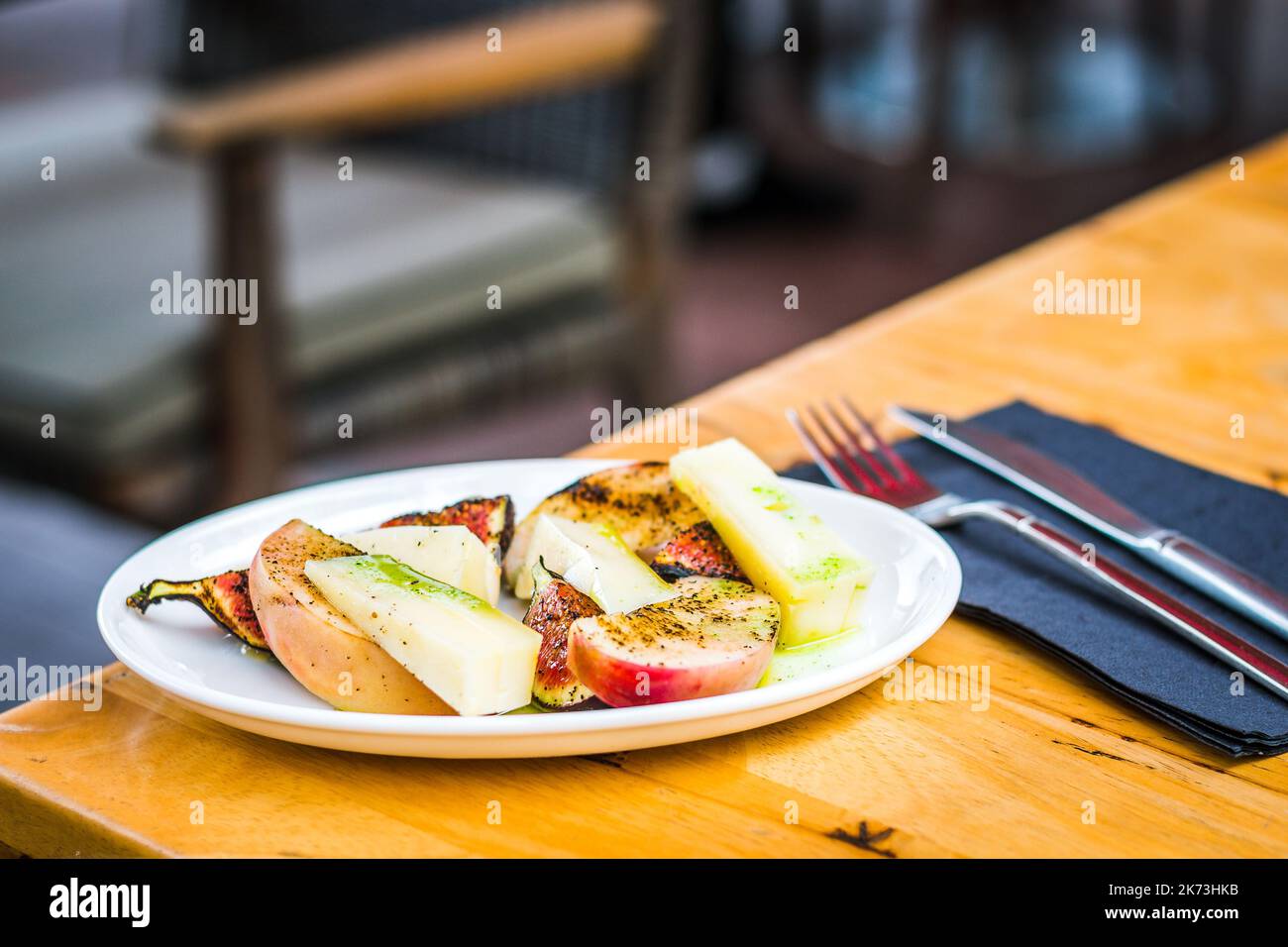 Fig & Peach appetiser of Grilled peach, grilled fig, taleggio cheese ...