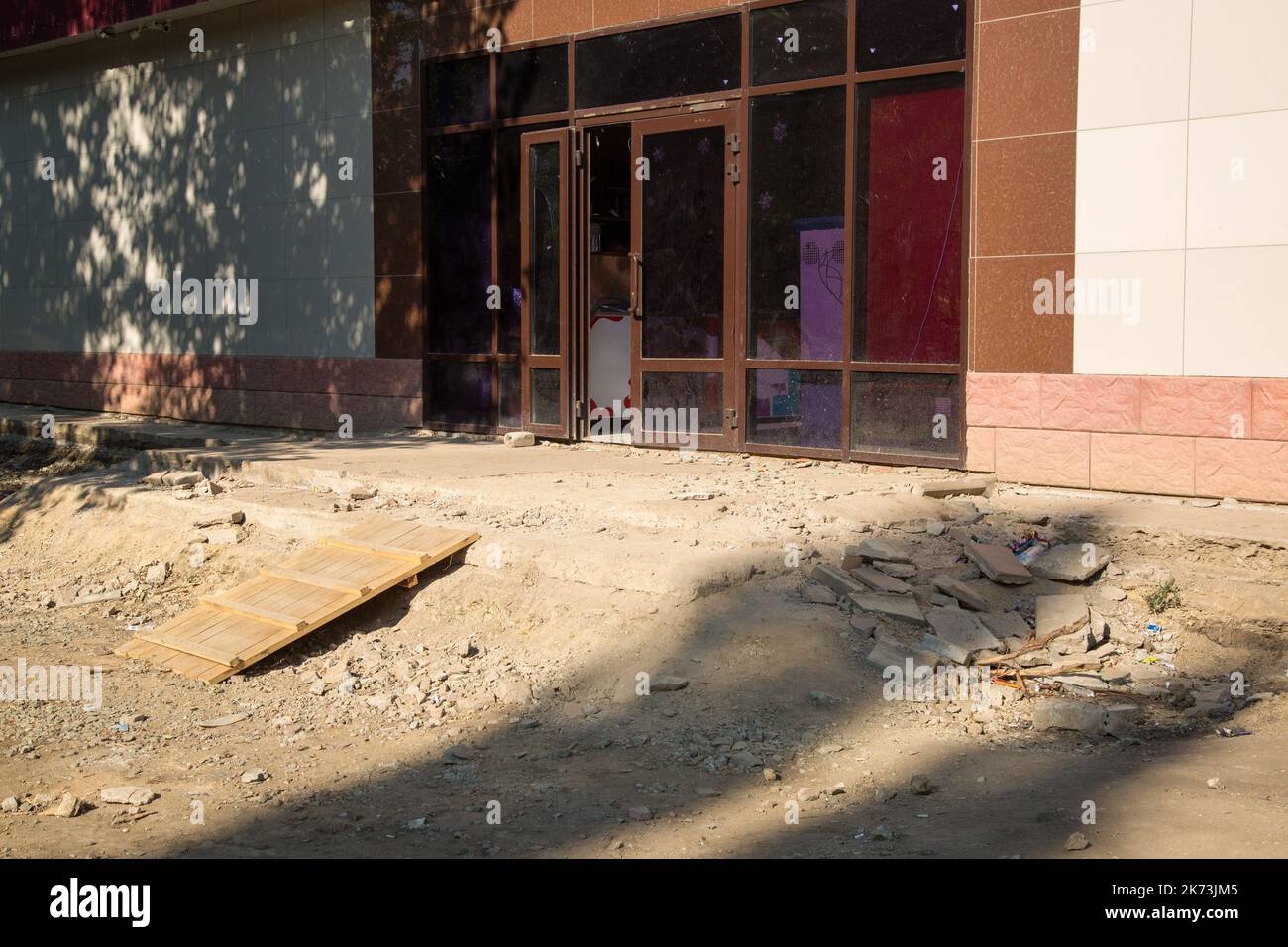 Destroyed entrance to the building, fragments stairs and debris Stock ...