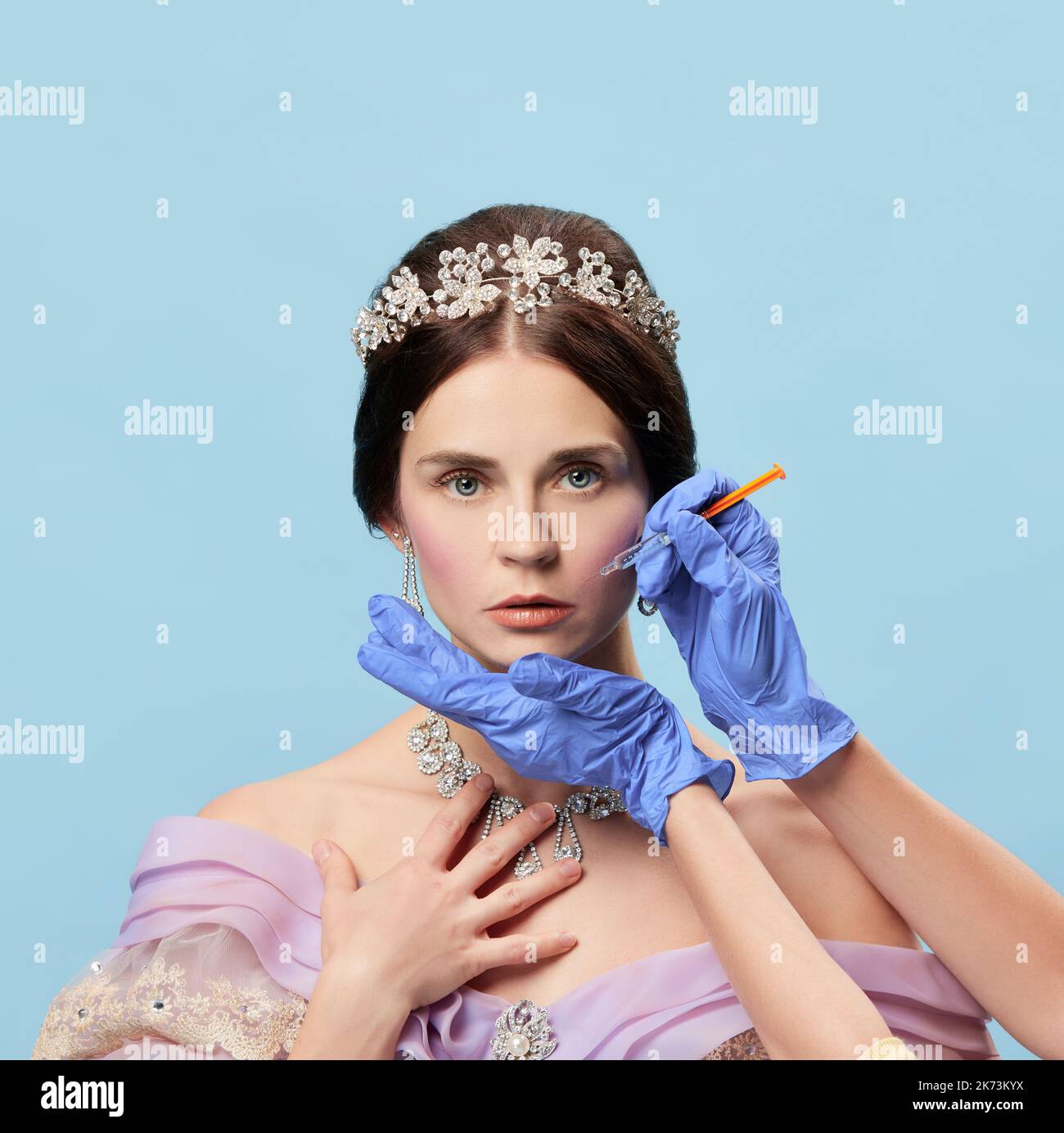 Half-length portrait of beautiful young woman in vintage dress and ...