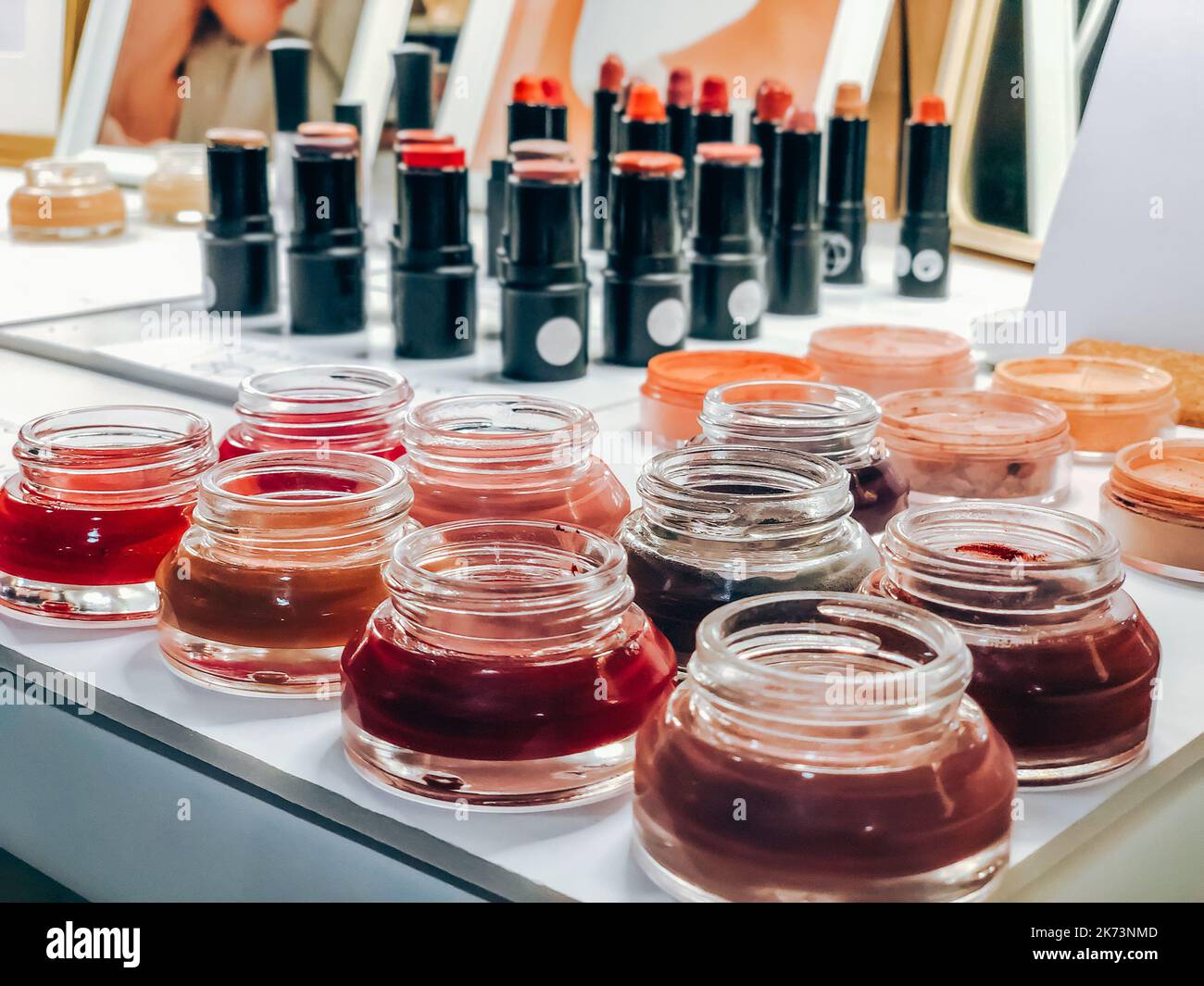 Makeup cosmetics beauty products: tint jars, facial powder, lipstick ...