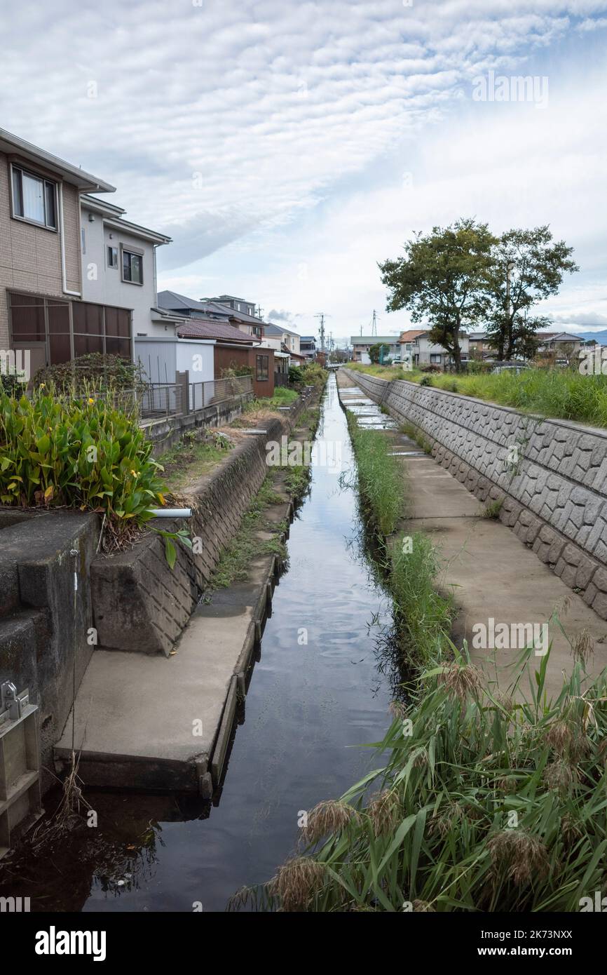 Yokkaichi, Mie Prefecture, Japan. 8th Oct, 2022. Canals running between ...