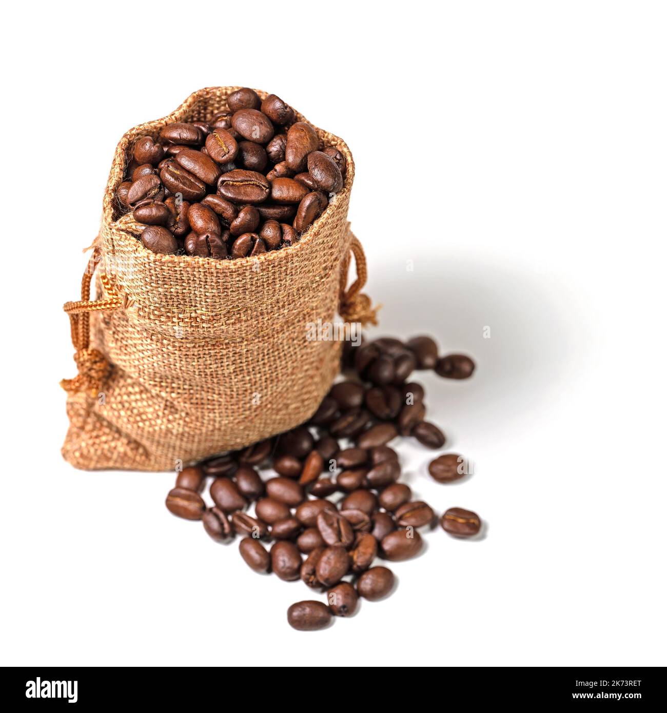 Roasted coffee beans in a jute sack Stock Photo - Alamy