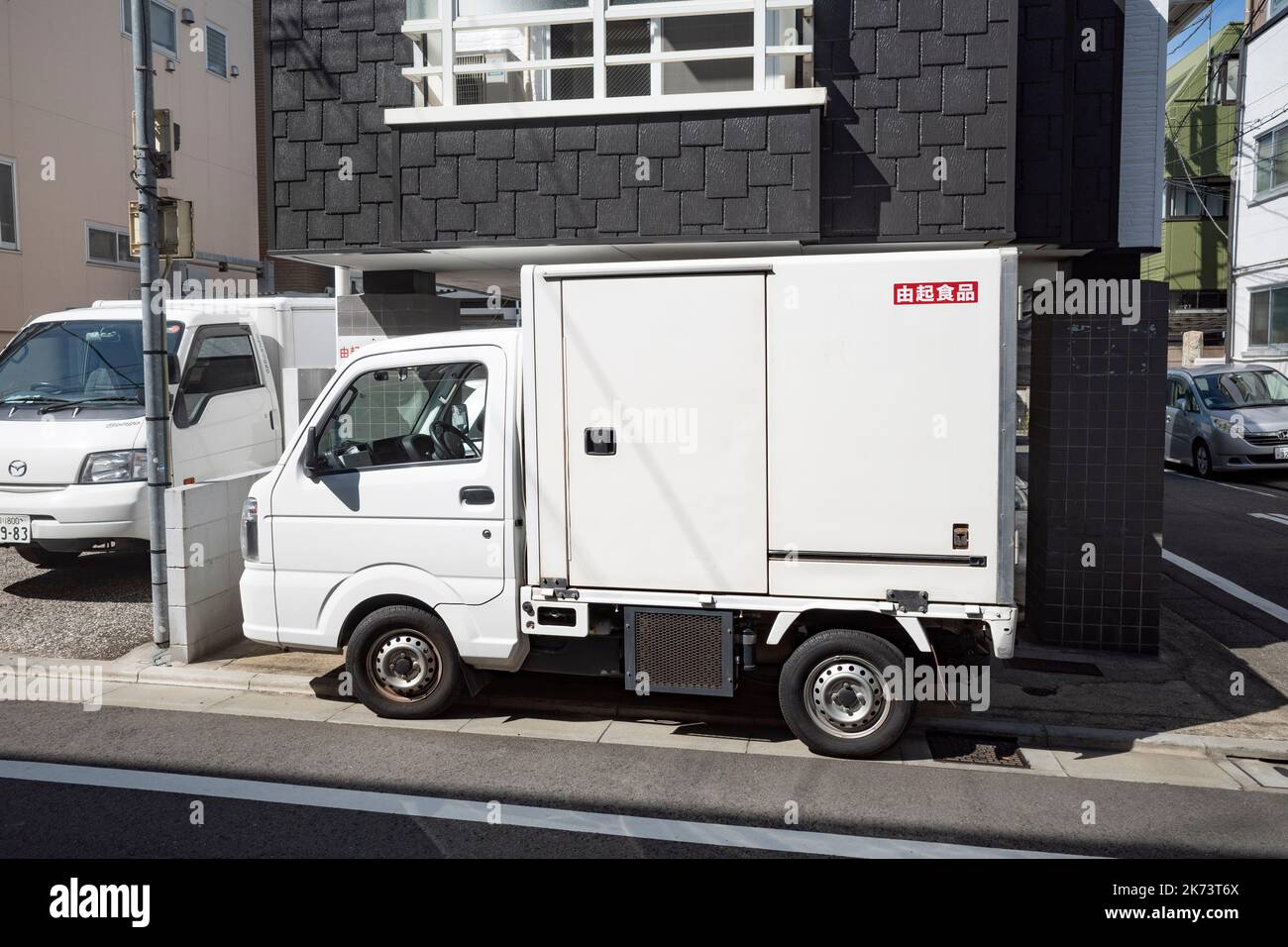 Tokyo, Japan. 11th Oct, 2022. A small delivery truck making a loading ...