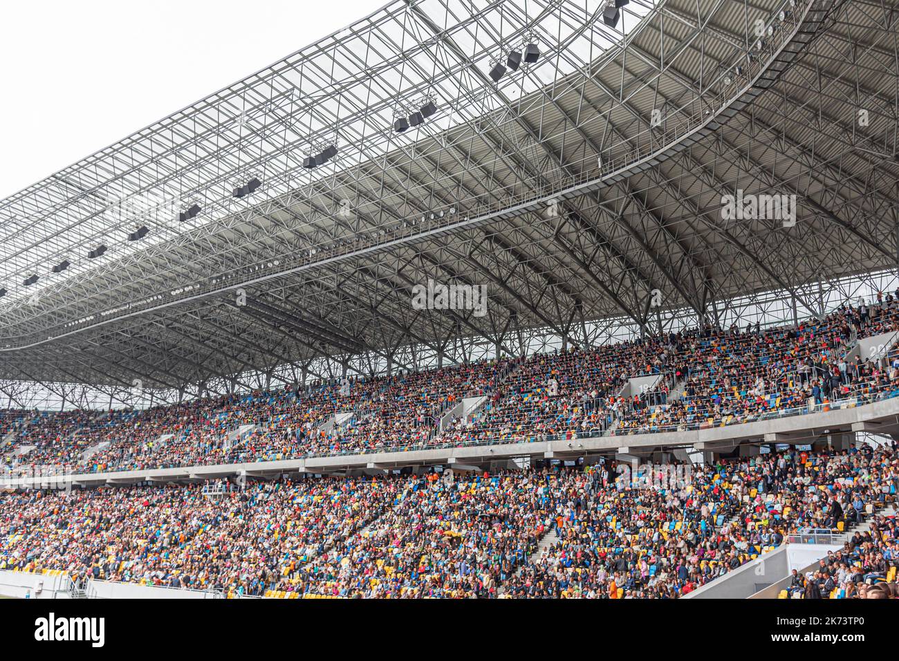 Spectators on the podium of the stadium Lviv-Arena Stock Photo - Alamy