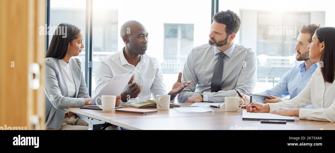 Their meetings are productive. a group of businesspeople having a ...