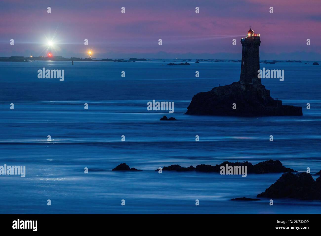 Night exposure of the famous La Vieille lighthouse illuminated with ...