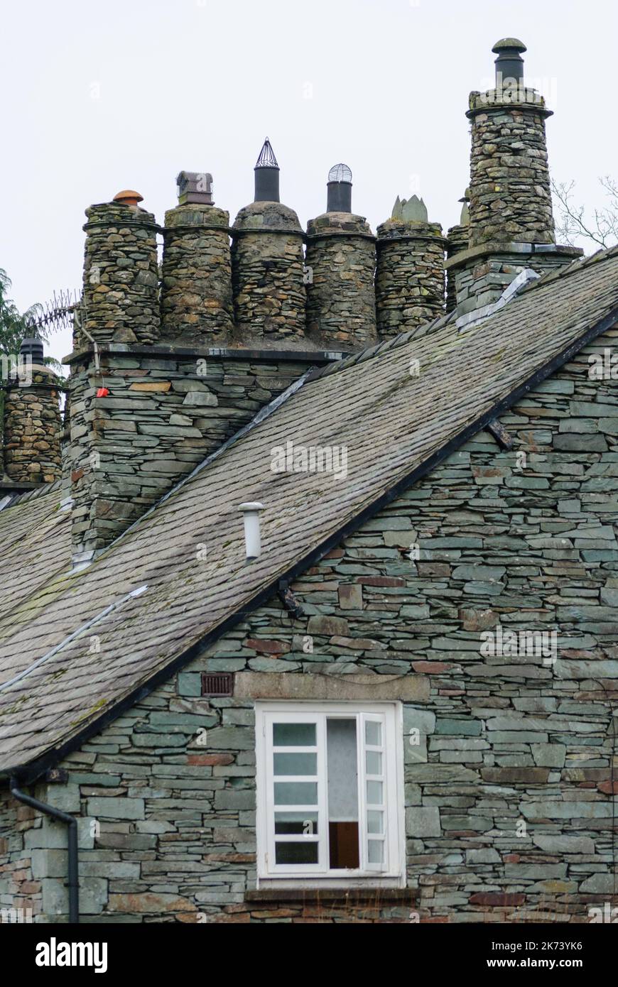 Lake District houses and round chimney stacks built with slate stone ...
