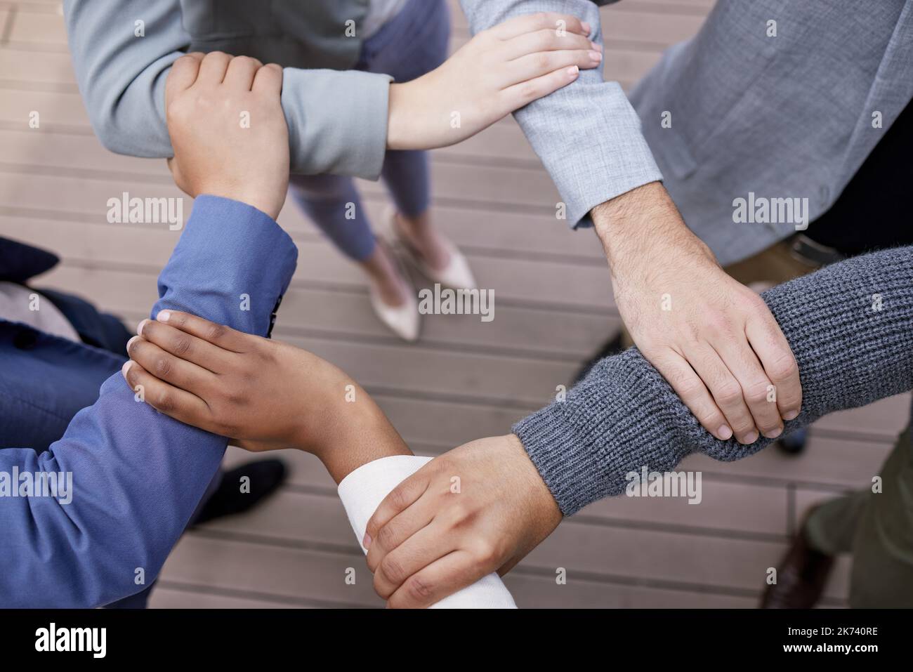 People supporting one another hi-res stock photography and images - Alamy