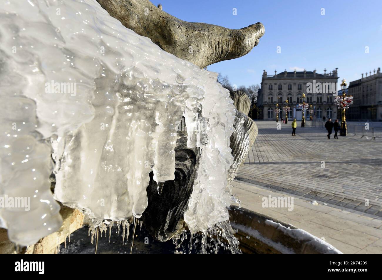 Nancy, France, jan 18th 2017 The Neptune fountain covered with ice ...