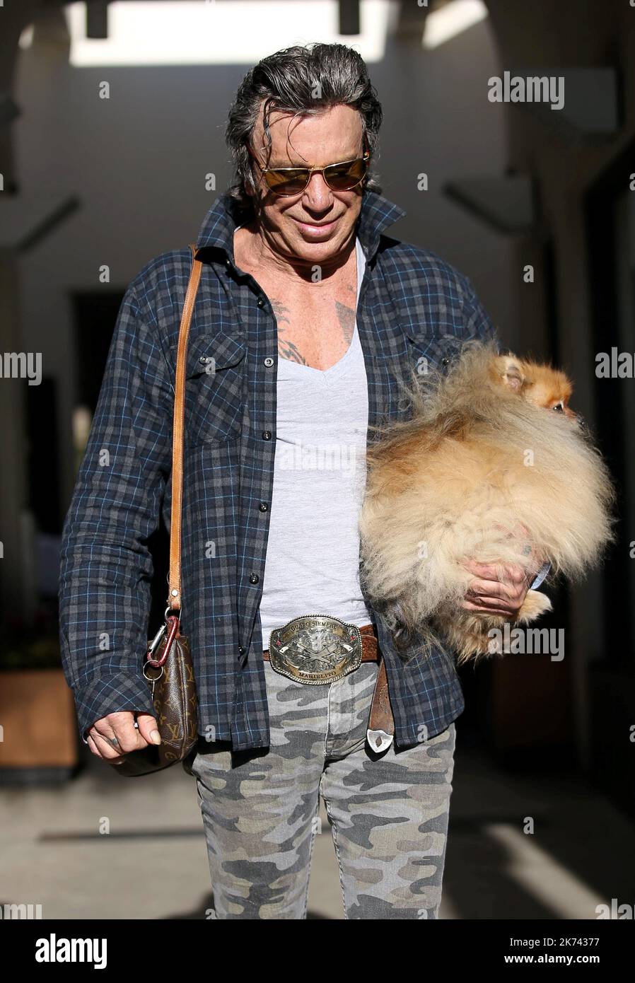 Mickey Rourke at Cafe Roma in Beverly Hills Stock Photo - Alamy