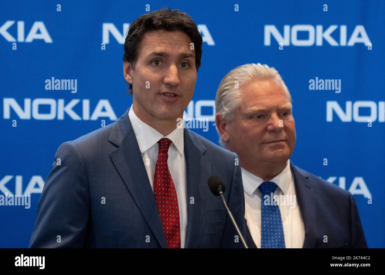 Ontario Premier Doug Ford looks on as Prime Minister Justin Trudeau ...