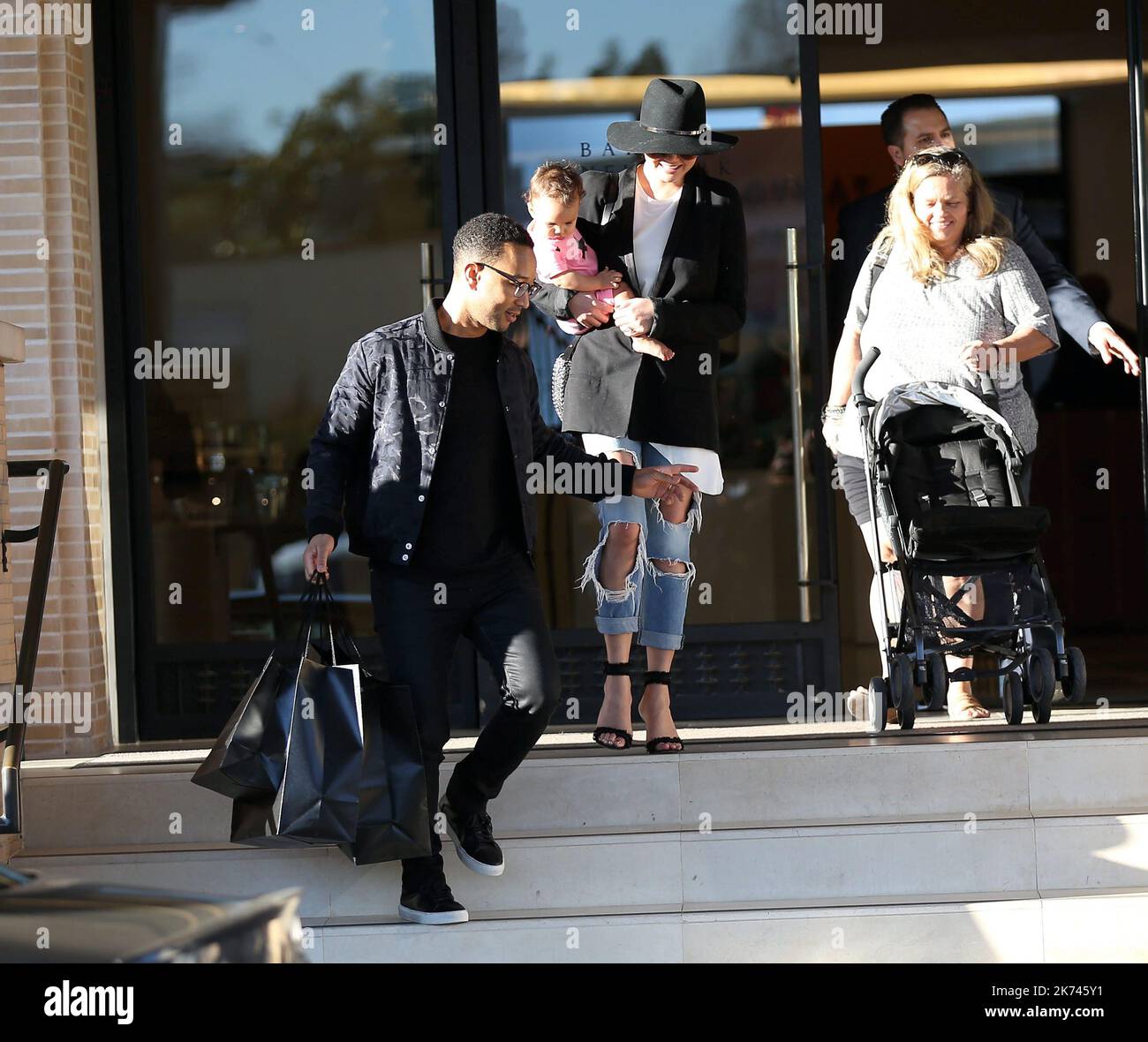 Chrissy Teigen and John Legend take baby Luna to Barneys New York for ...