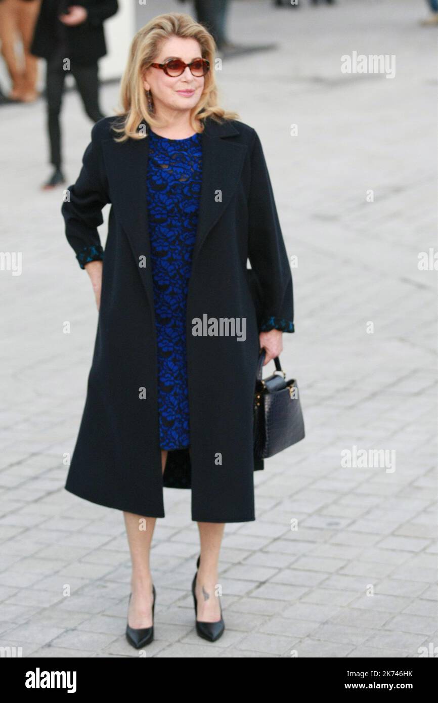 Catherine Deneuve arrives at the Louis Vuitton Pret a Porter fashion ...