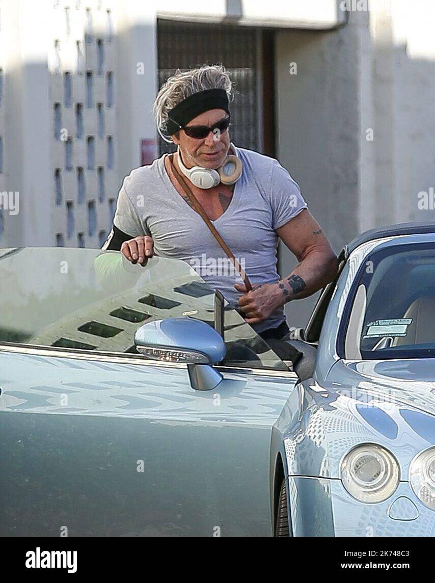 Mickey Rourke is seen entering a blue Bentley in Beverly Hills, USA ...