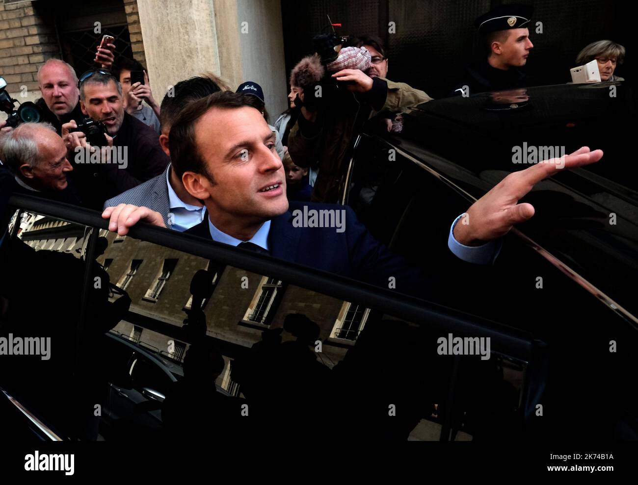Emmanuel Macron comes out of his Paris apartment Stock Photo - Alamy