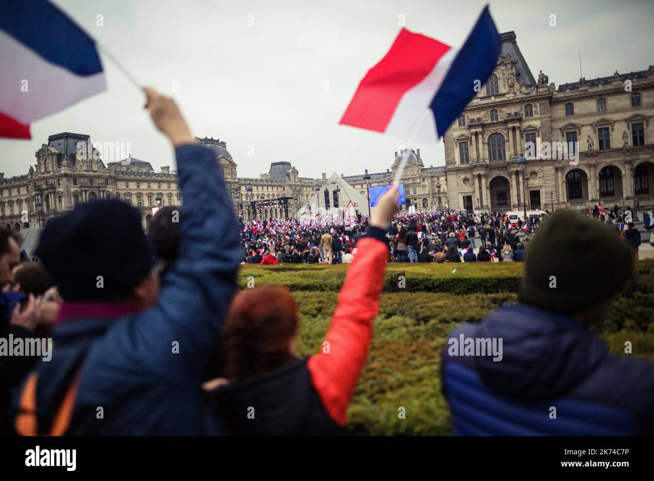 Several thousand people gathered at the esplanade of the Louvre to ...