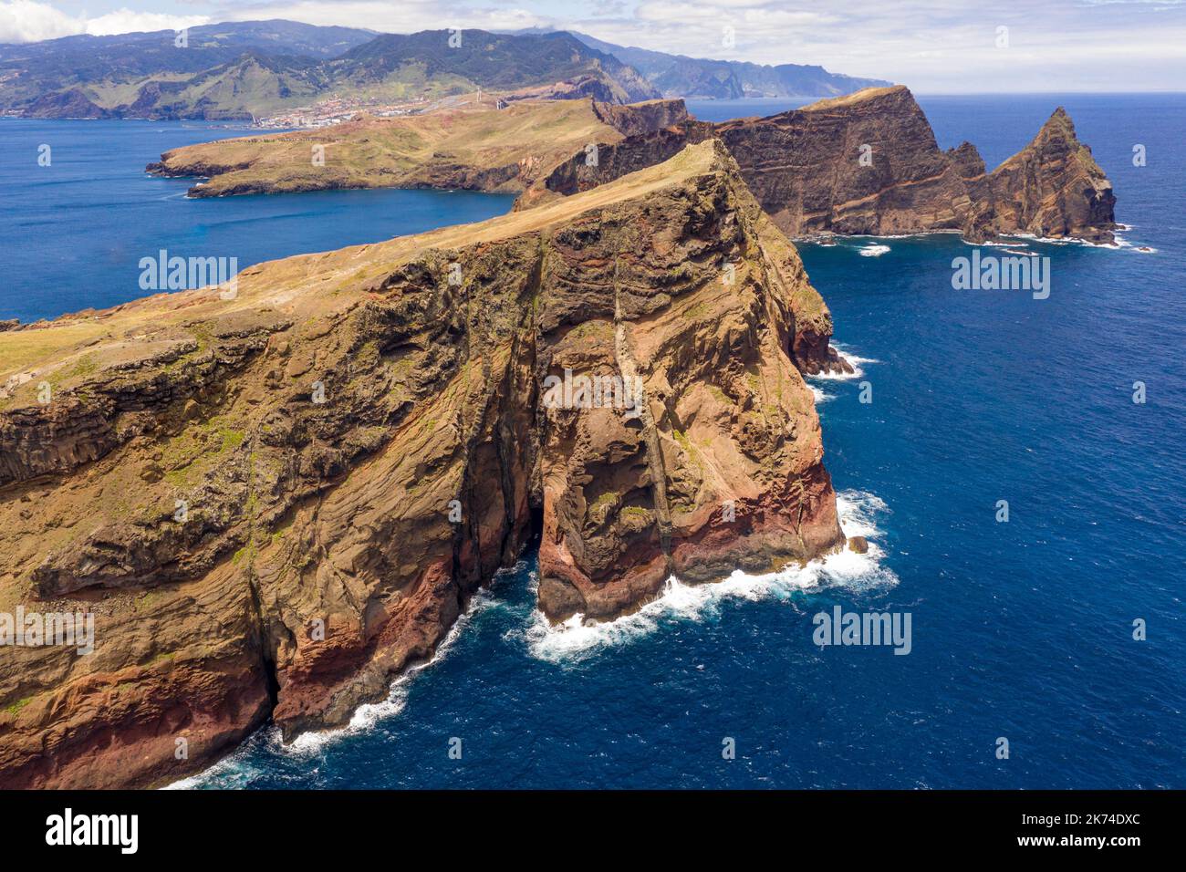 Drone photography of mountain cliff near sea during summer day in ...