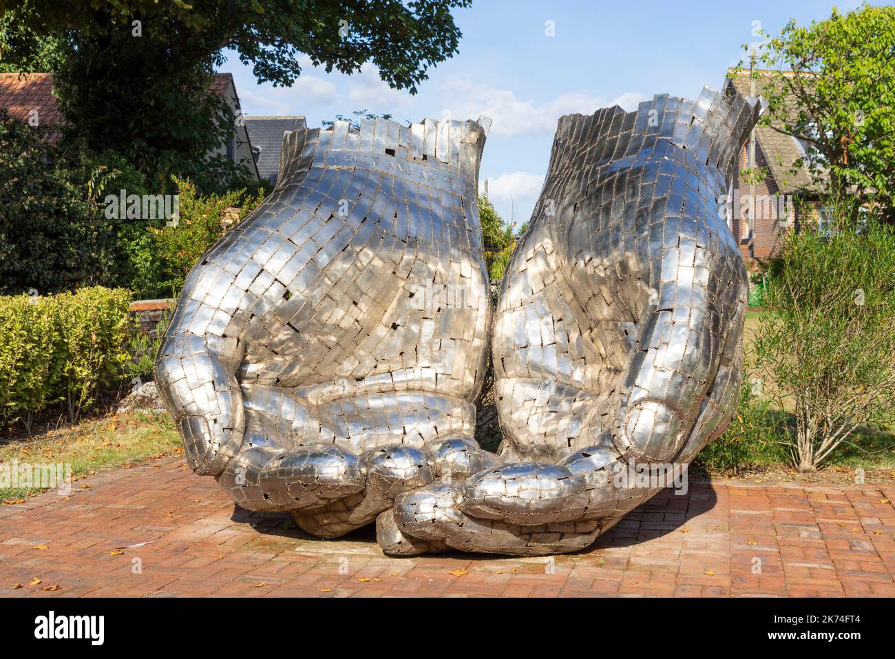 Sculpture of two cupped hands hi-res stock photography and images - Alamy