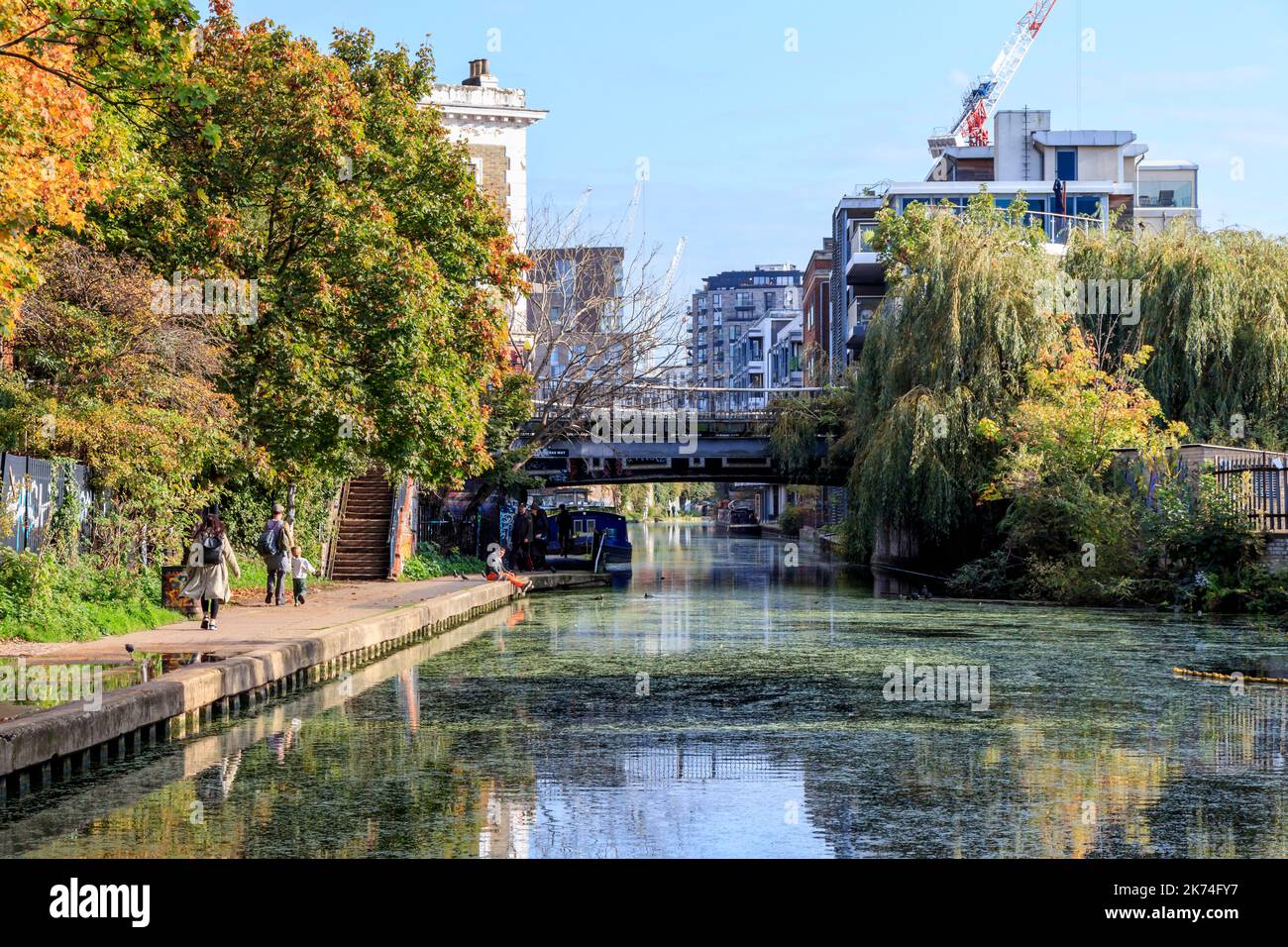 A view east along Regents Canal, St Pancras Way bridge in the distance ...
