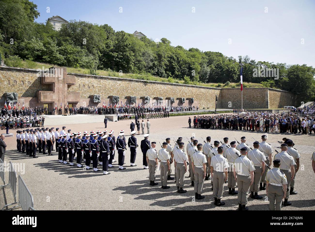 President Emmanuel Macron attends at a ceremony to mark the 77th ...