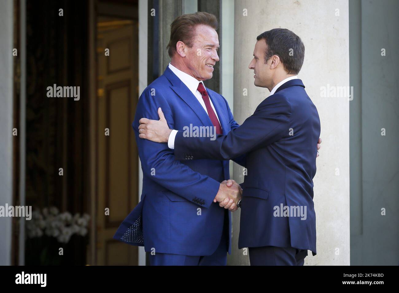 French president Emmanuel Macron receives the Former California ...
