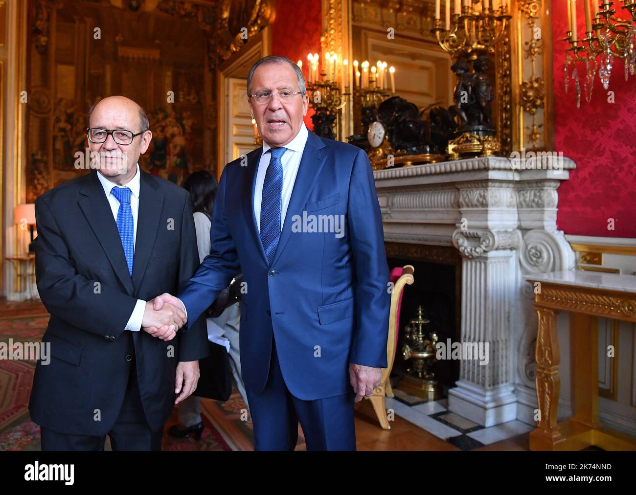 French Foreign Minister, Jean-Yves Le Drian, left, greets his Russian ...