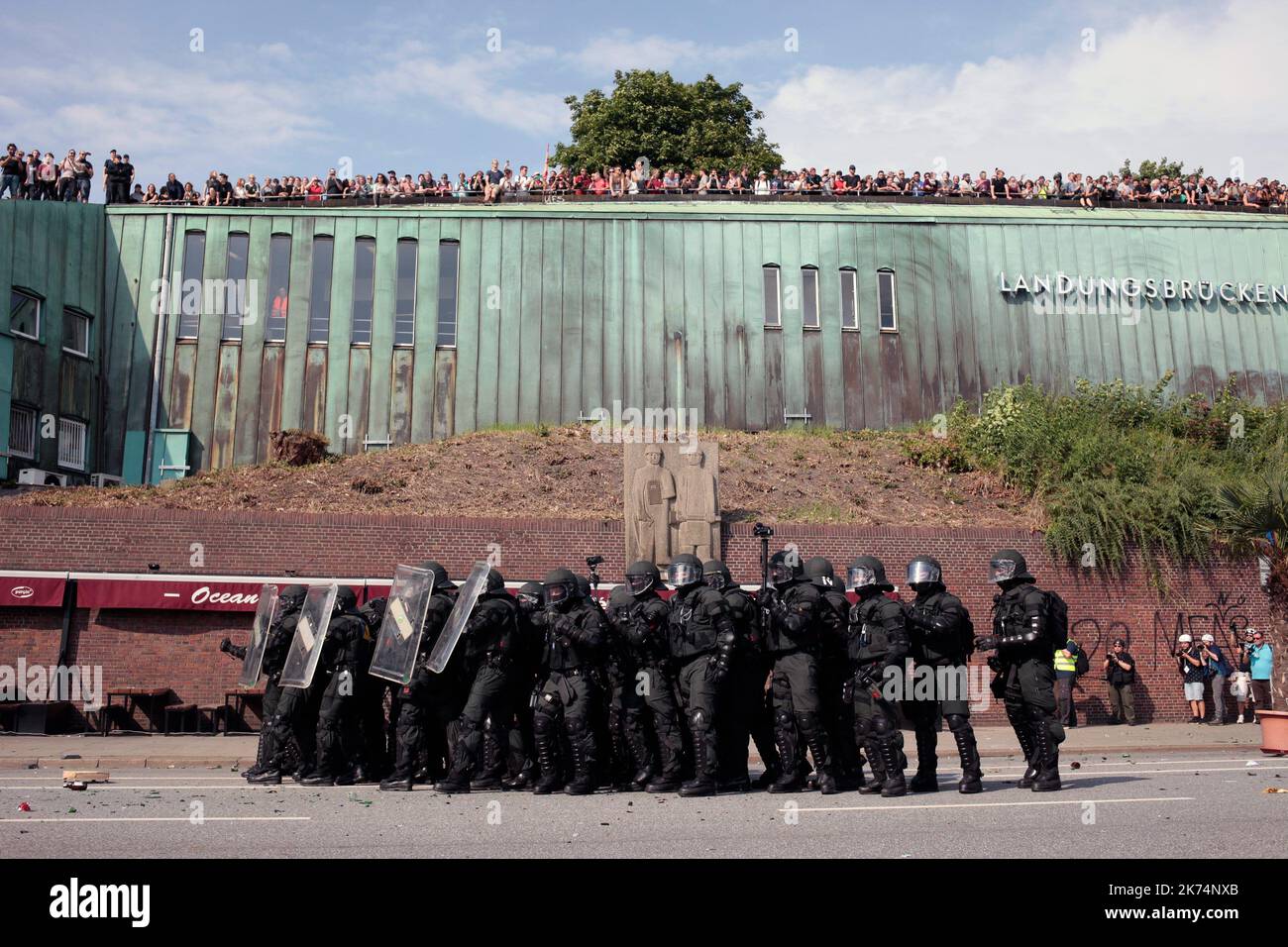 Police forces clash with protesters on the first day of the G20 summit ...