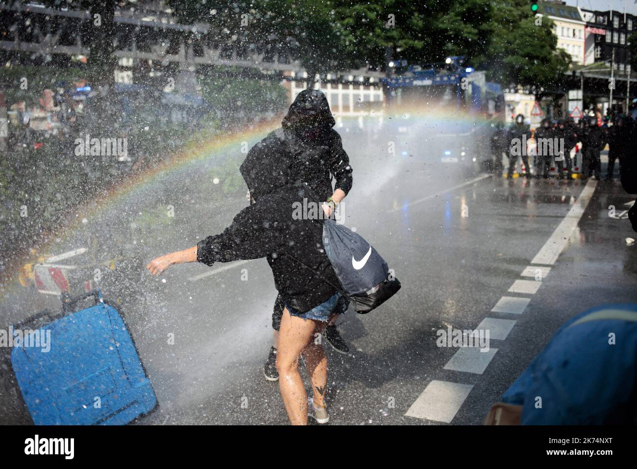 Police forces clash with protesters on the first day of the G20 summit ...