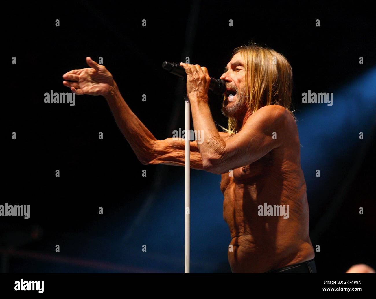 Iggy Pop performing on stage during the Festival Les Deferlantes ...