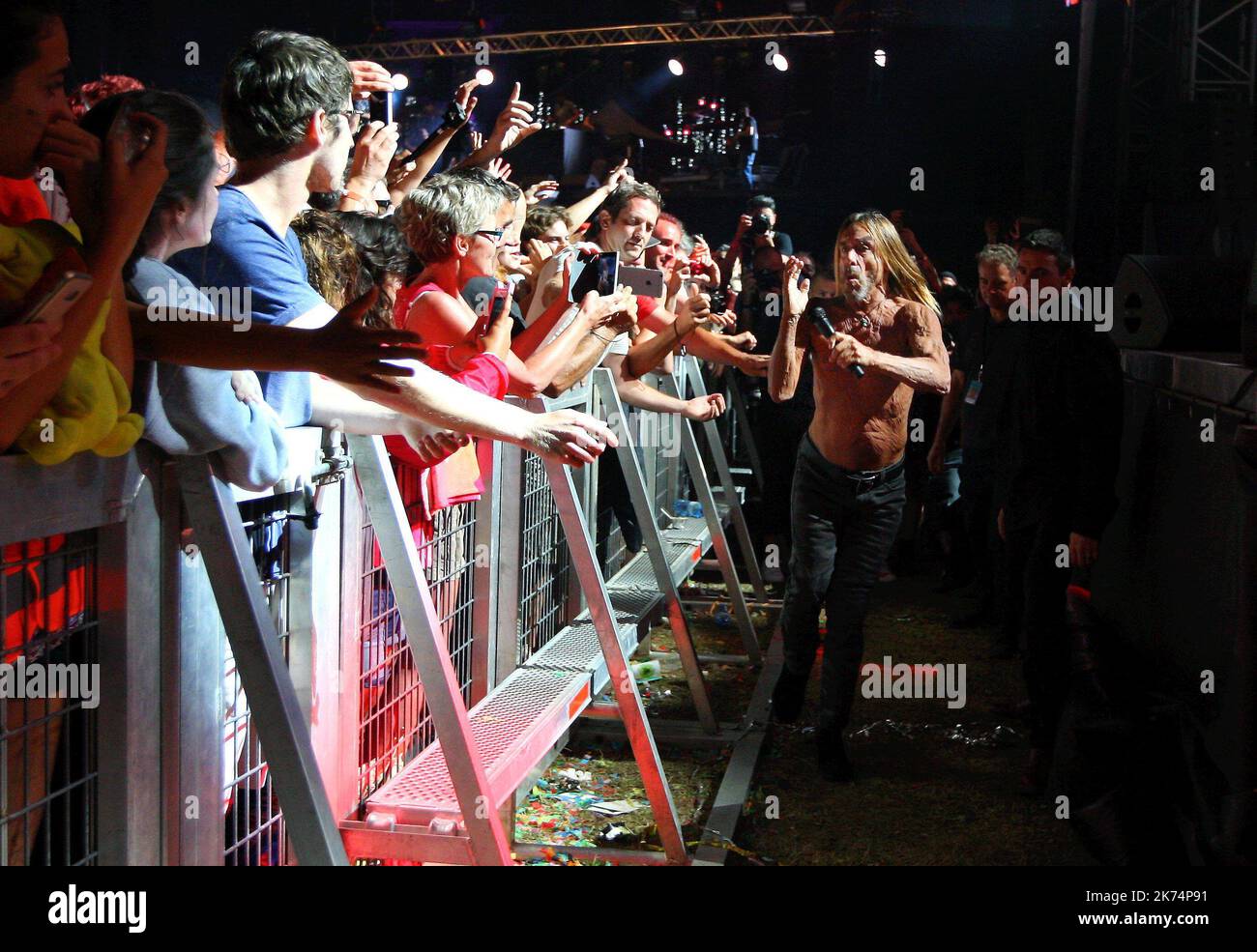 Iggy Pop performing on stage during the Festival Les Deferlantes ...