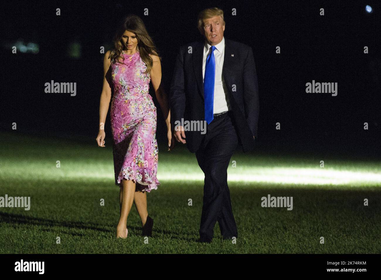 President Donald Trump and Melania Trump, U.S. First Lady cross the ...