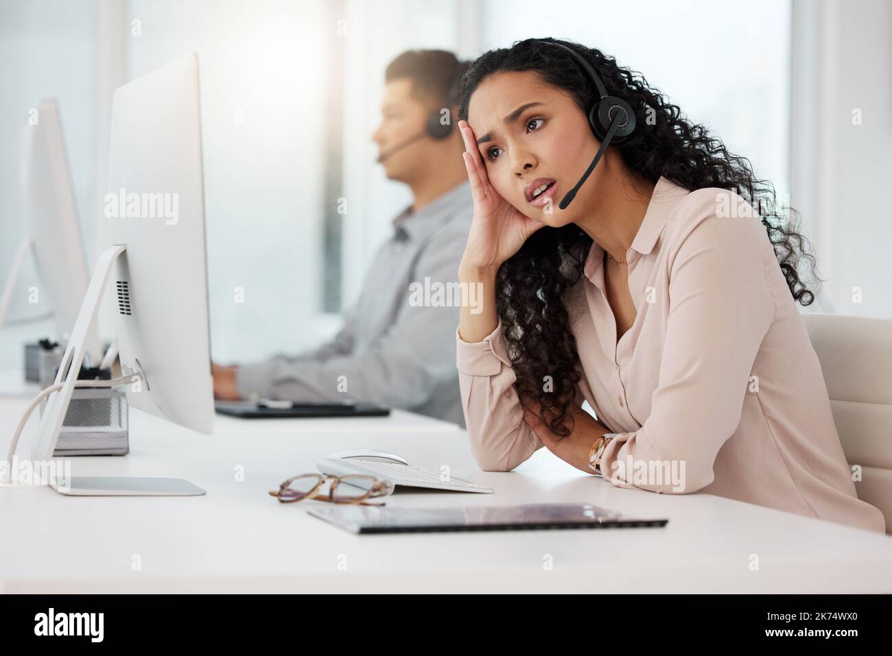 Call centre worker unhappy hi-res stock photography and images - Alamy