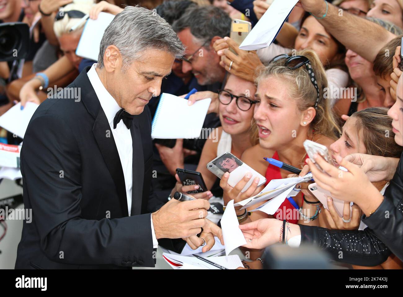 George Clooney with fans arriving for Suburbicon red carpet premiere at ...