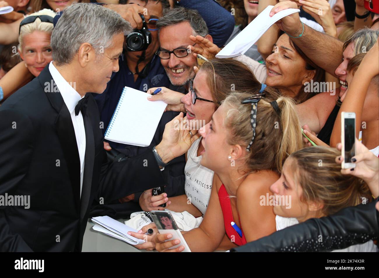 George Clooney with fans arriving for Suburbicon red carpet premiere at ...