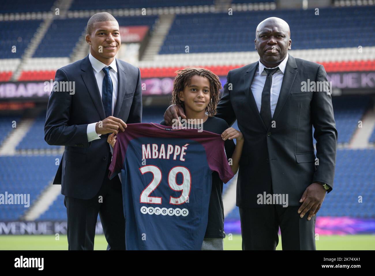 Paris Saint-Germain's new forward Kylian Mbappe poses with family Stock ...