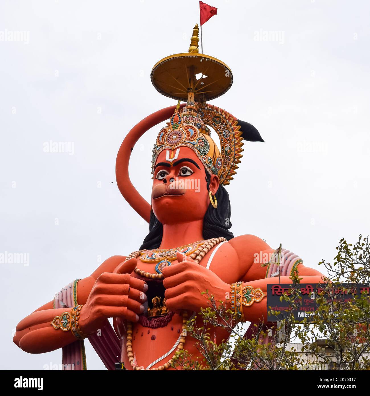 Big statue of Lord Hanuman near the delhi metro bridge situated near ...