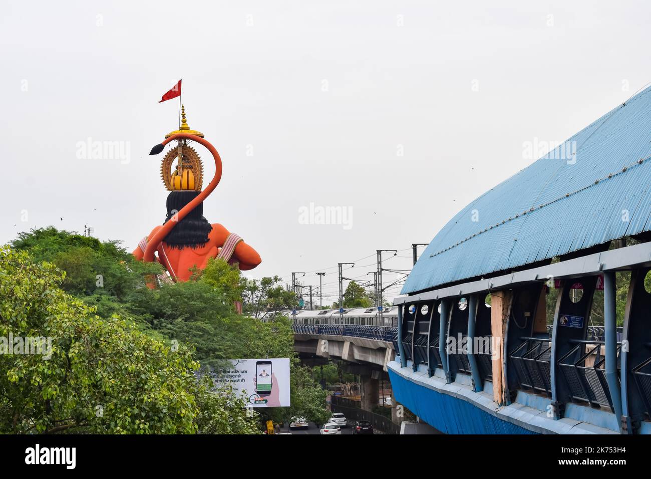 Big statue of Lord Hanuman near the delhi metro bridge situated near ...
