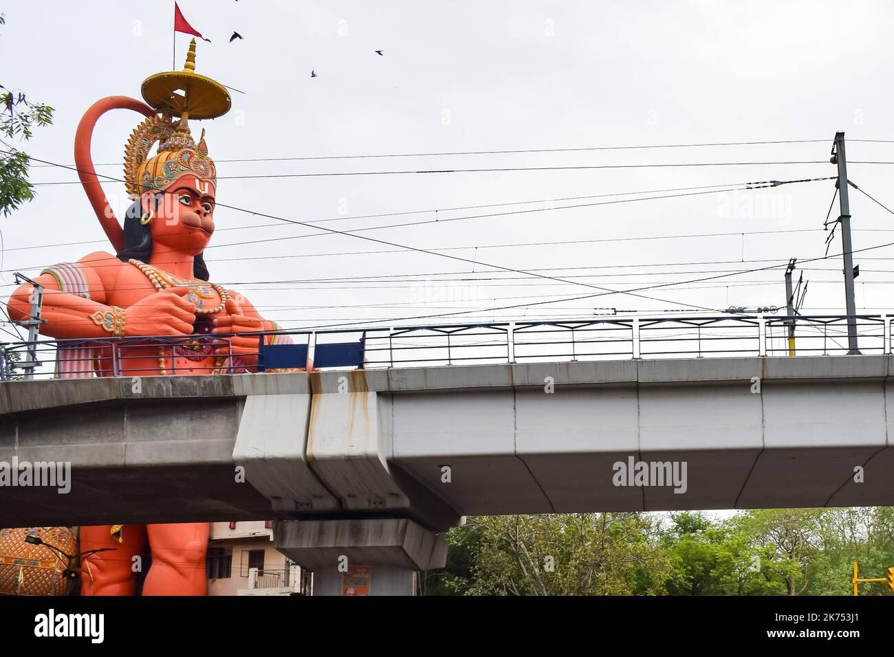 Big statue of Lord Hanuman near the delhi metro bridge situated near ...