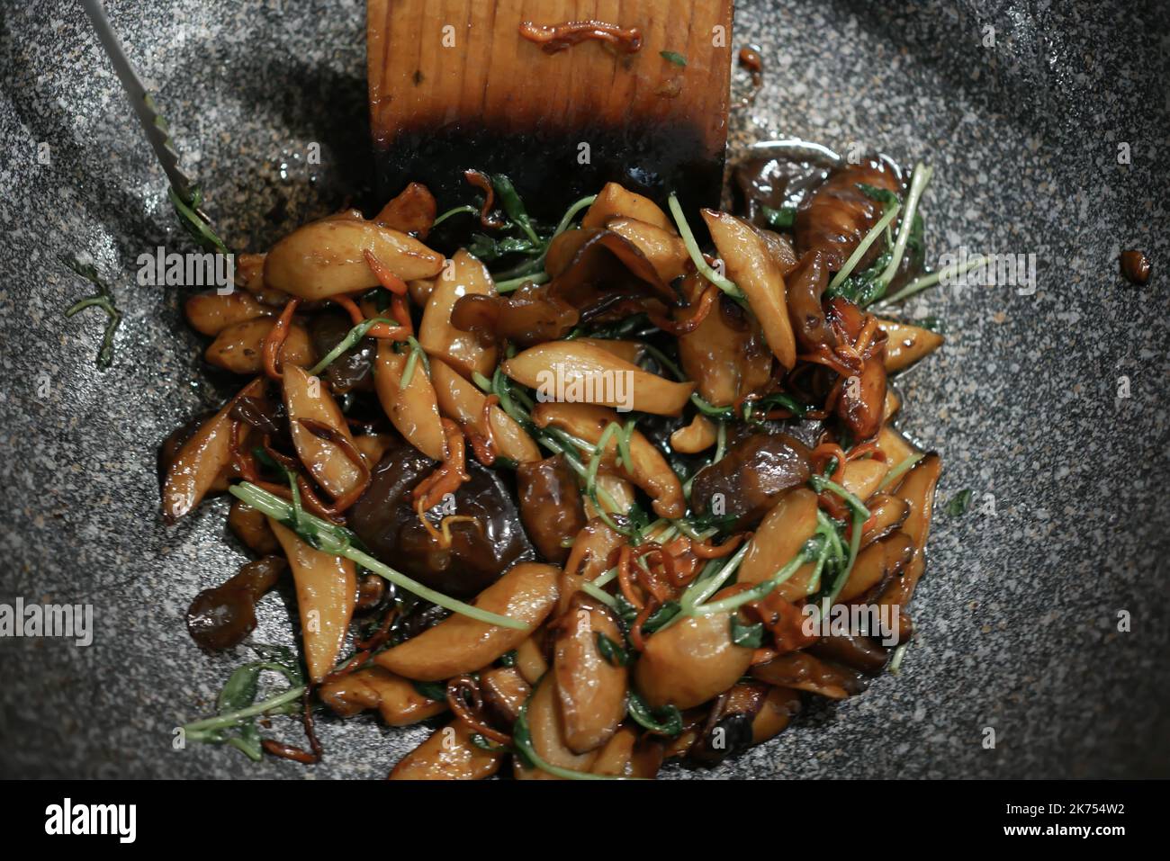 top view of cooking mushroom in a cooking pan Stock Photo - Alamy