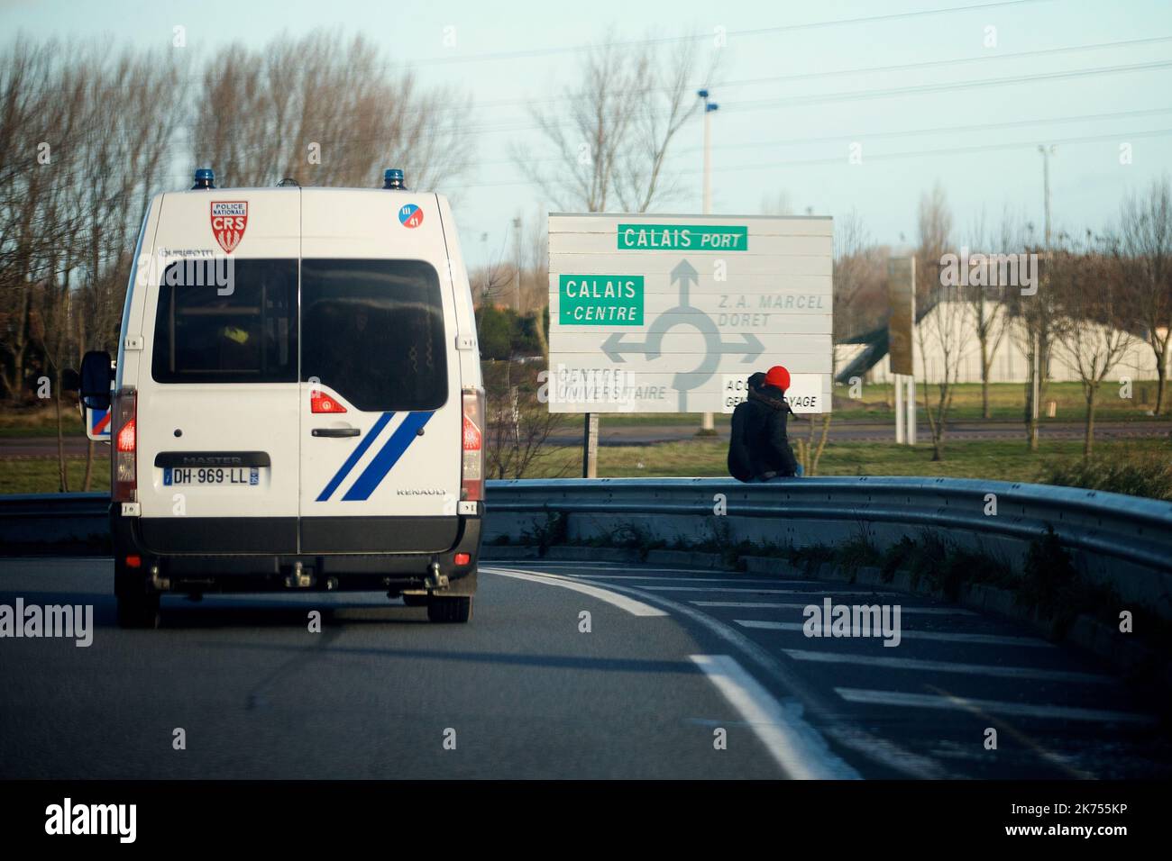 Calai, France, dec 14th 2014 Migrants along high speed motorway A16 ...