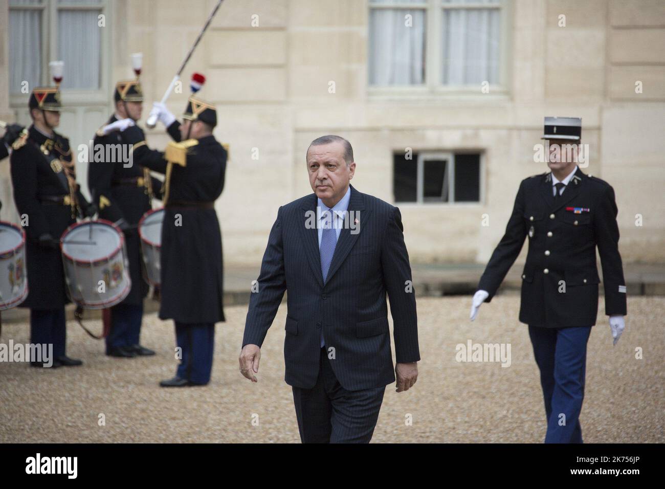 Turkish President Recep Tayyip Erdogan, right, is welcomed by French ...