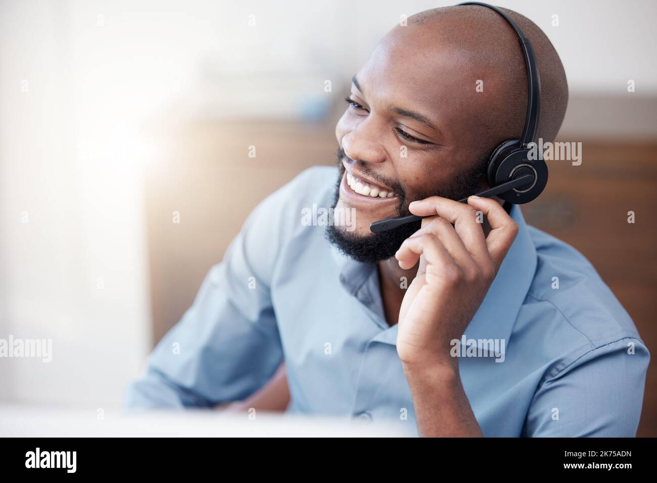 Glad I could help. a handsome young male call center agent working on ...