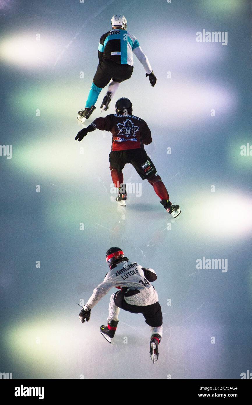 Ice skaters compete in the final of the Redbull Crashed Ice, the Ice ...