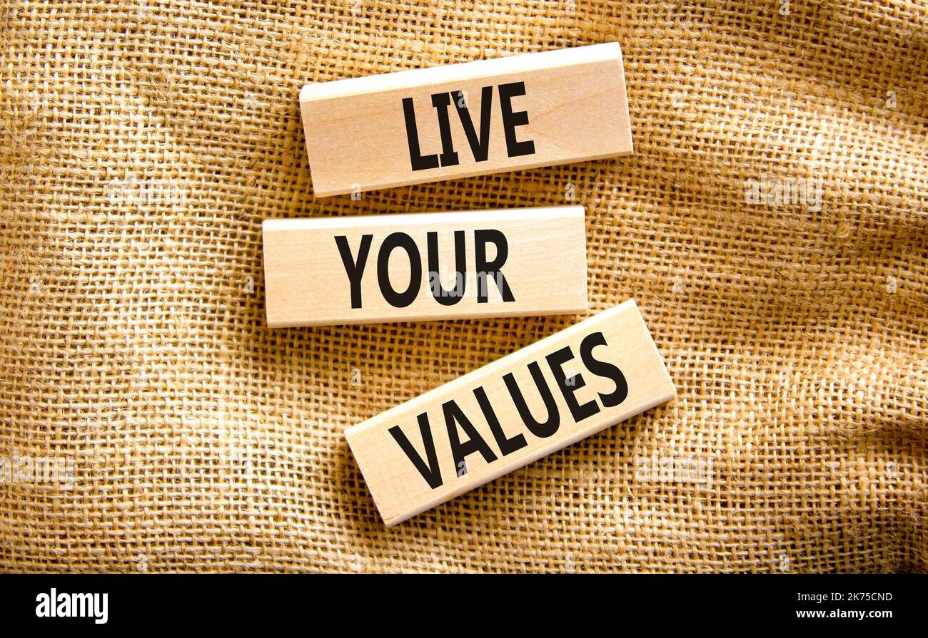 Live your values symbol. Concept words Live your values on wooden ...
