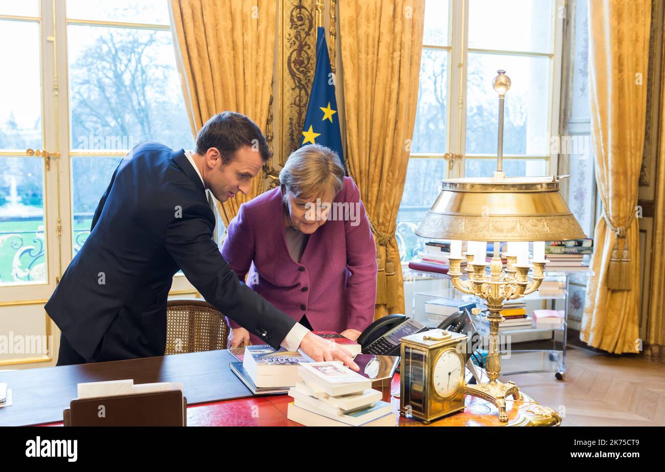 French President Emmanuel Macron meets on his office German Chancellor ... French President Emmanuel Macron meets on his office German Chancellor ...